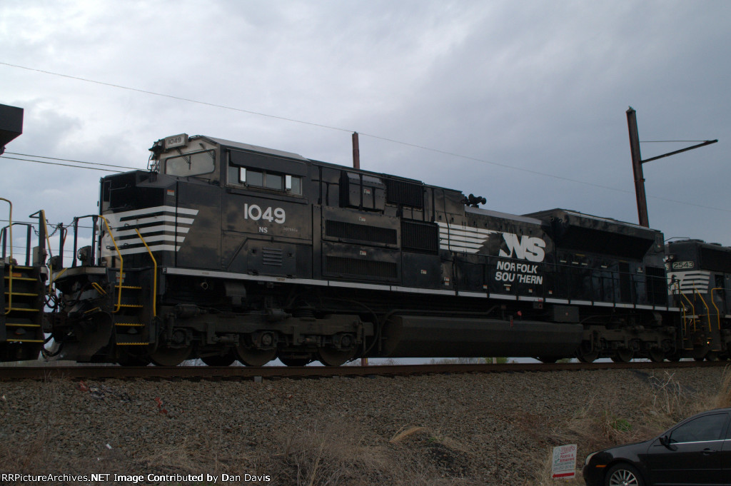 NS SD70ACe 1049 trails on 60Z